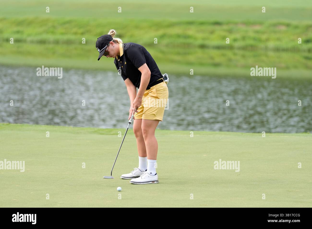 Gigi Stoll putts on the fifth hole during the second round of the ...