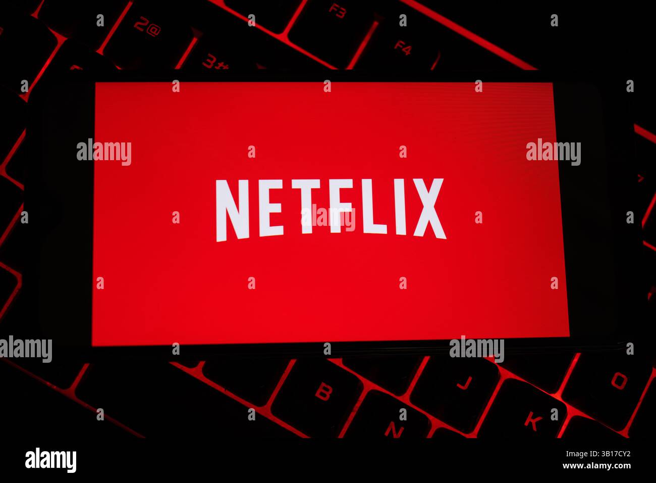SEATTLE, WA, USA - APR 7, 2025: Netflix logo is seen on a smartphone ...