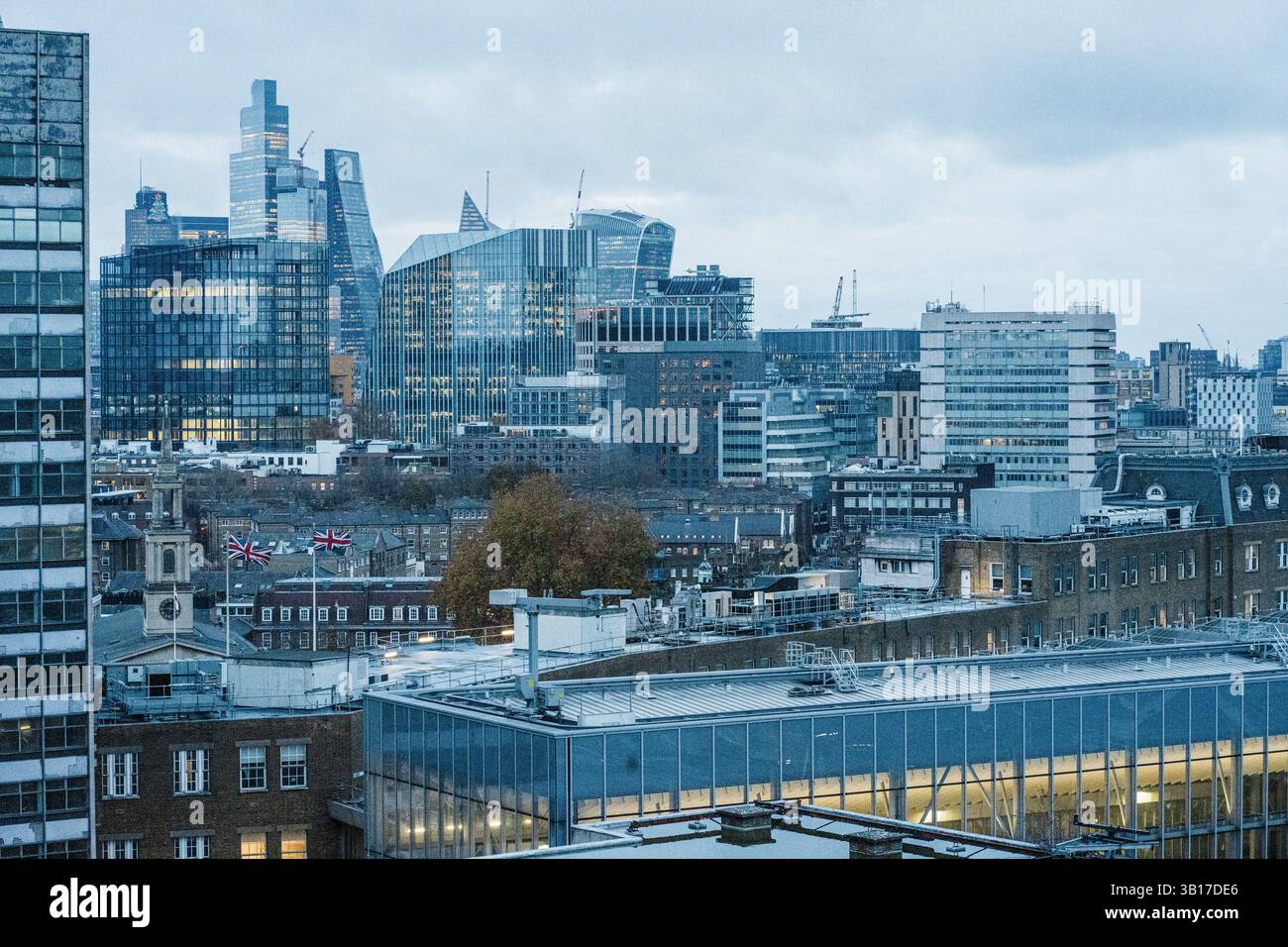 The City of London skyline at dusk, featuring iconic skyscrapers and ...