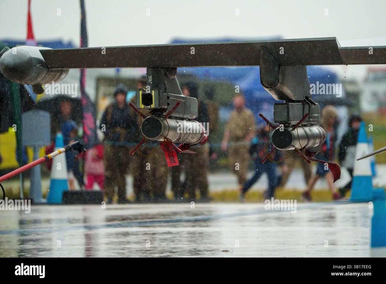 Close-up of missiles mounted on a RAF Typhoon wing in rainy conditions ...