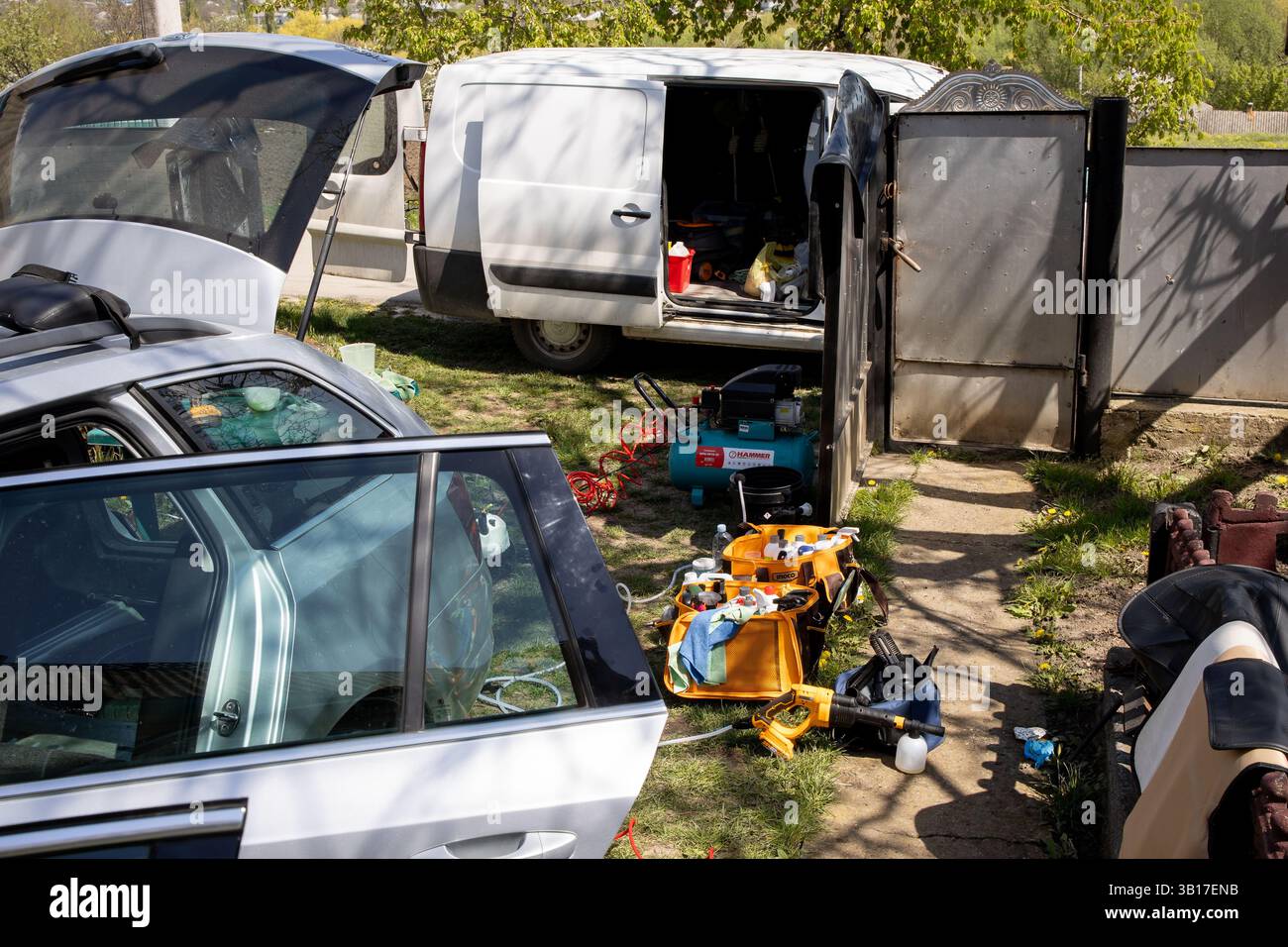 Dry cleaning of the car interior at home. The yard is full of chemical ...