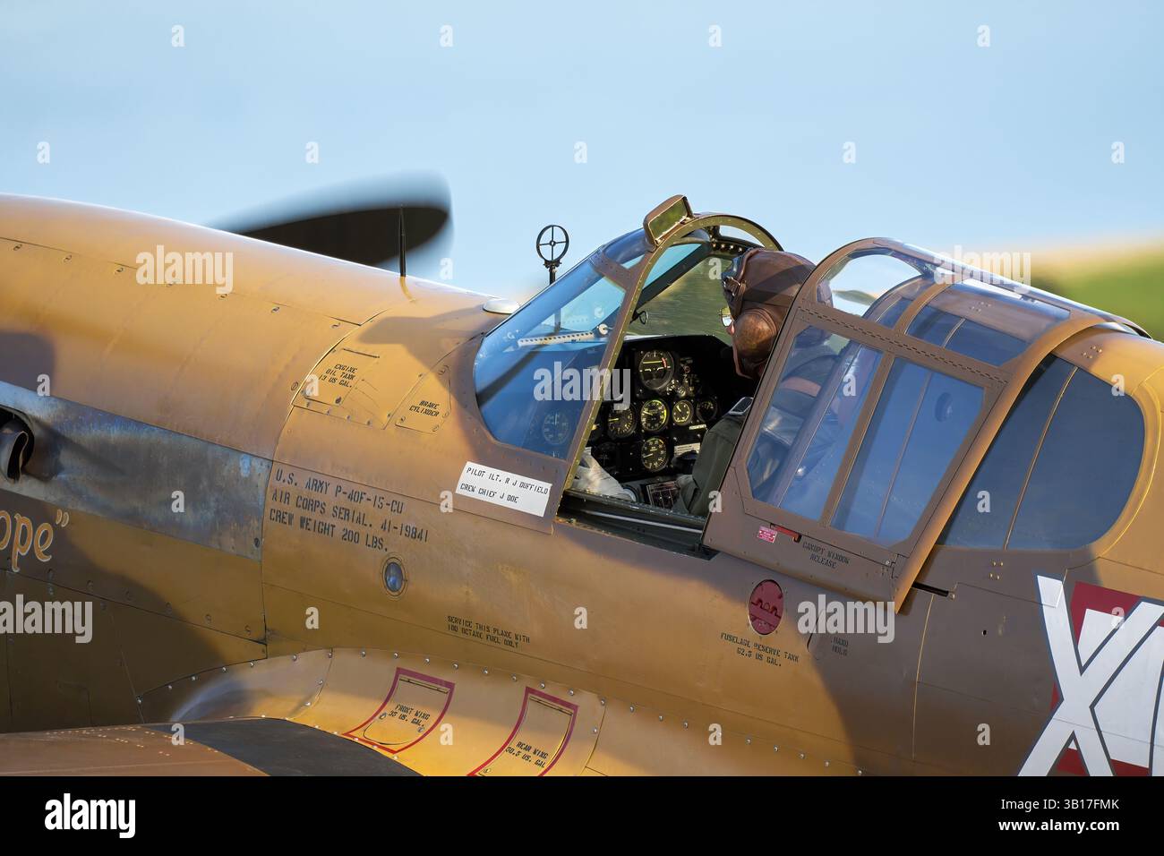 Close-up of a Curtiss P-40 Warhawk's cockpit with pilot, highlighting ...