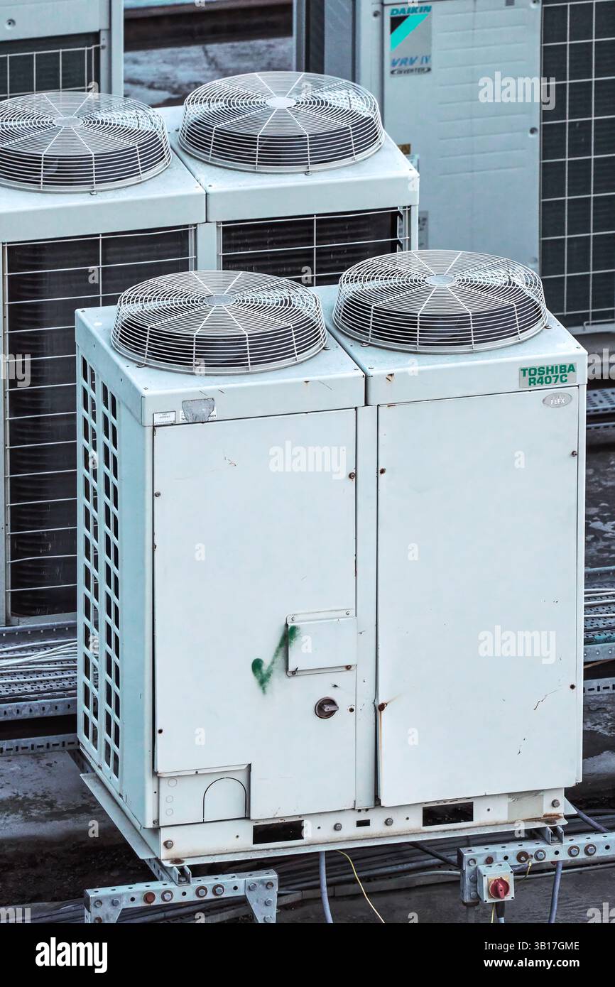 Industrial air conditioning units on a rooftop, showcasing cooling ...