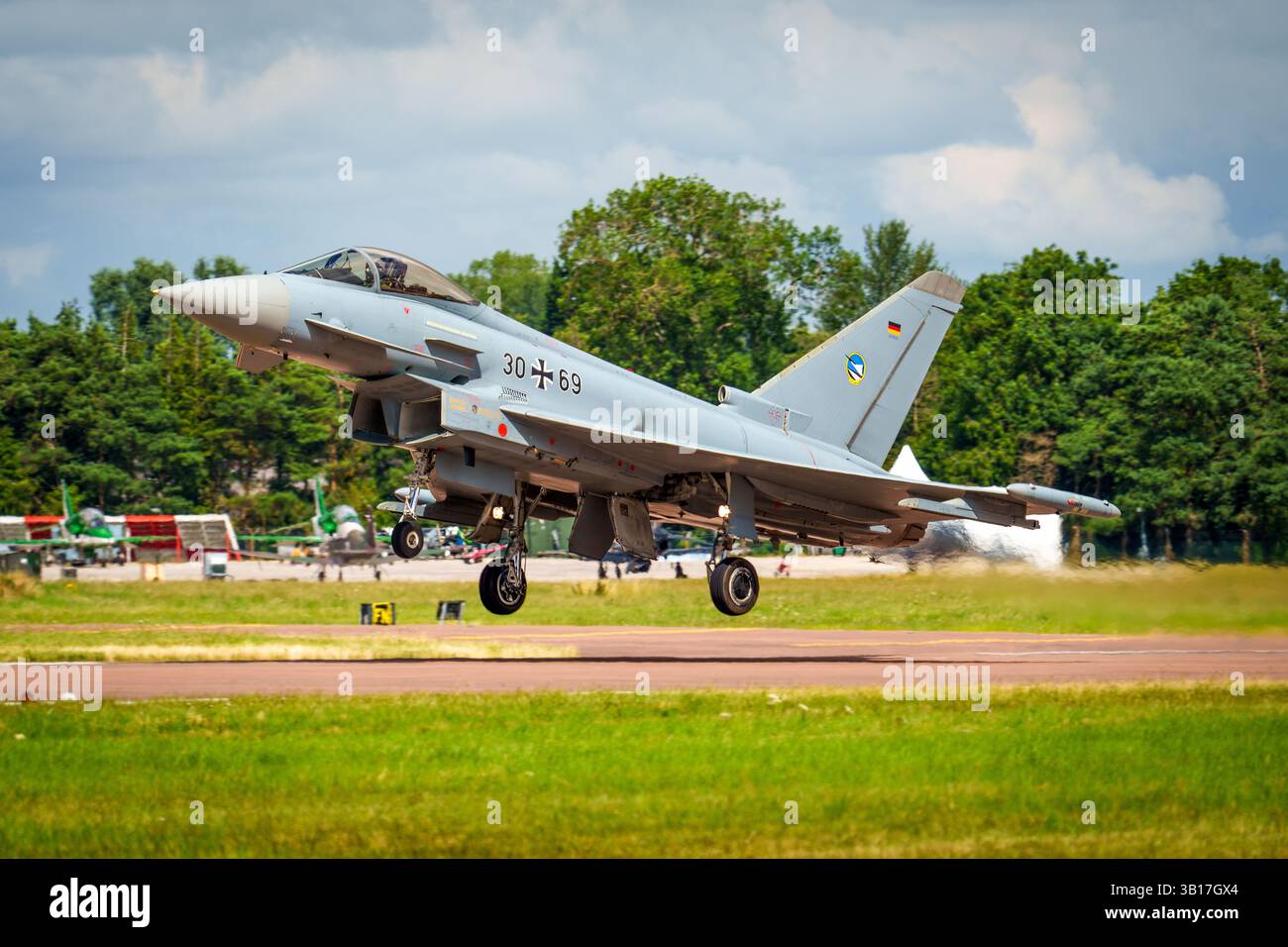 A German Air Force Luftwaffe Eurofighter Typhoon comes in to land after ...