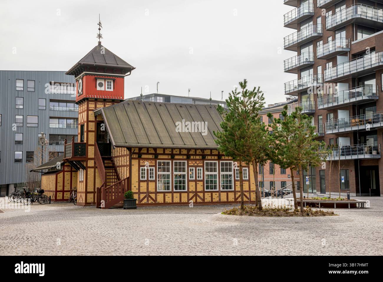 Traditional European-style structure amidst contemporary buildings ...