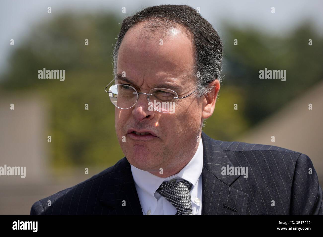 Acting U.S. Attorney John J. Durham speaks during a news conference ...