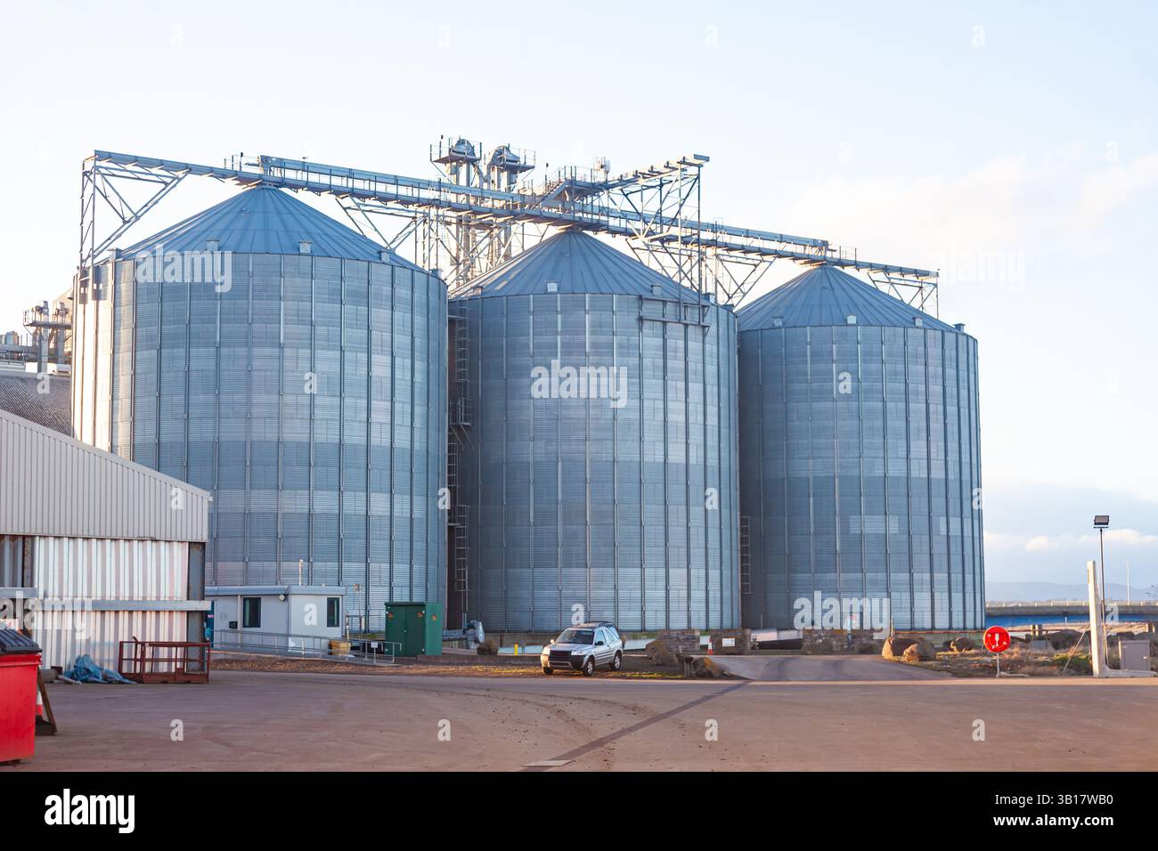 Grain storage terminal with tanks in a seaport Stock Photo - Alamy