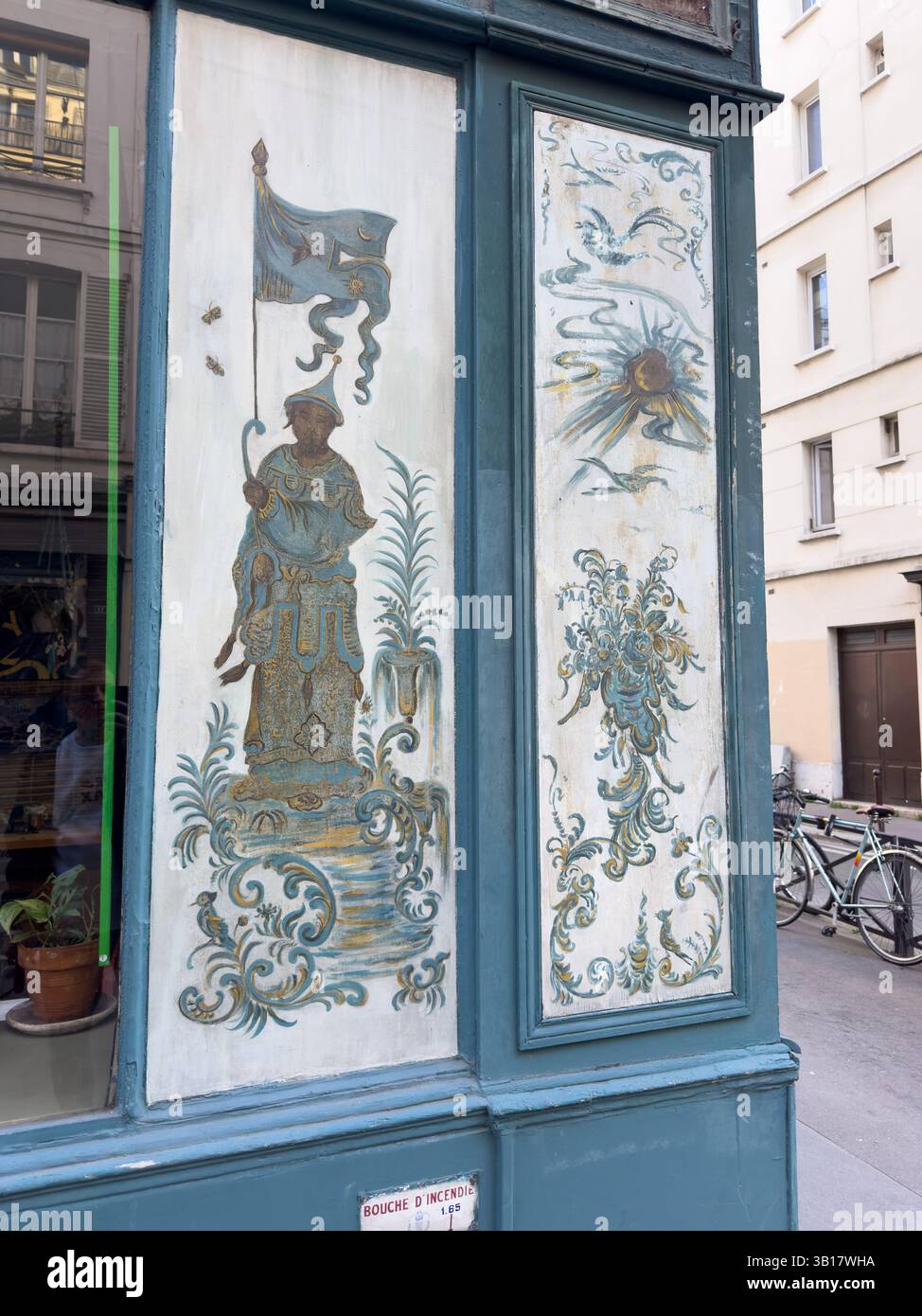 Intricate mural depicting a historical figure holding a flag with ...