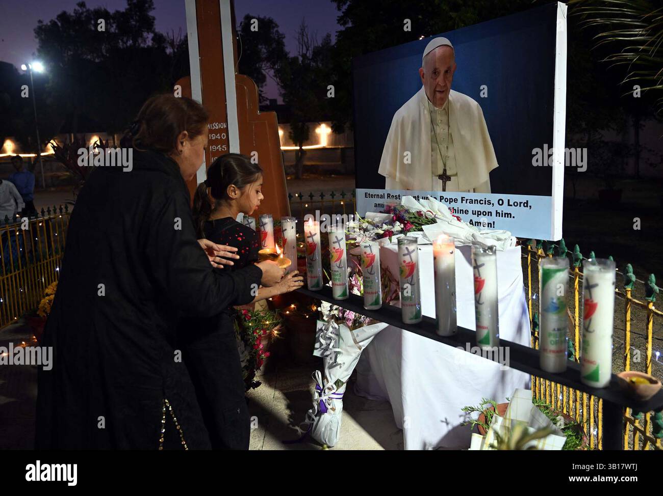 Members of the Christian community attend a mass following Pope Francis ...