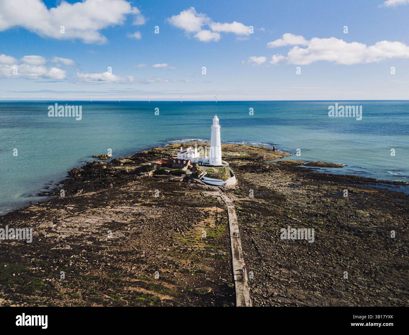 Whitley Bay UK: 13th April 2025: St Mary's Lighthouse is highlighted in ...