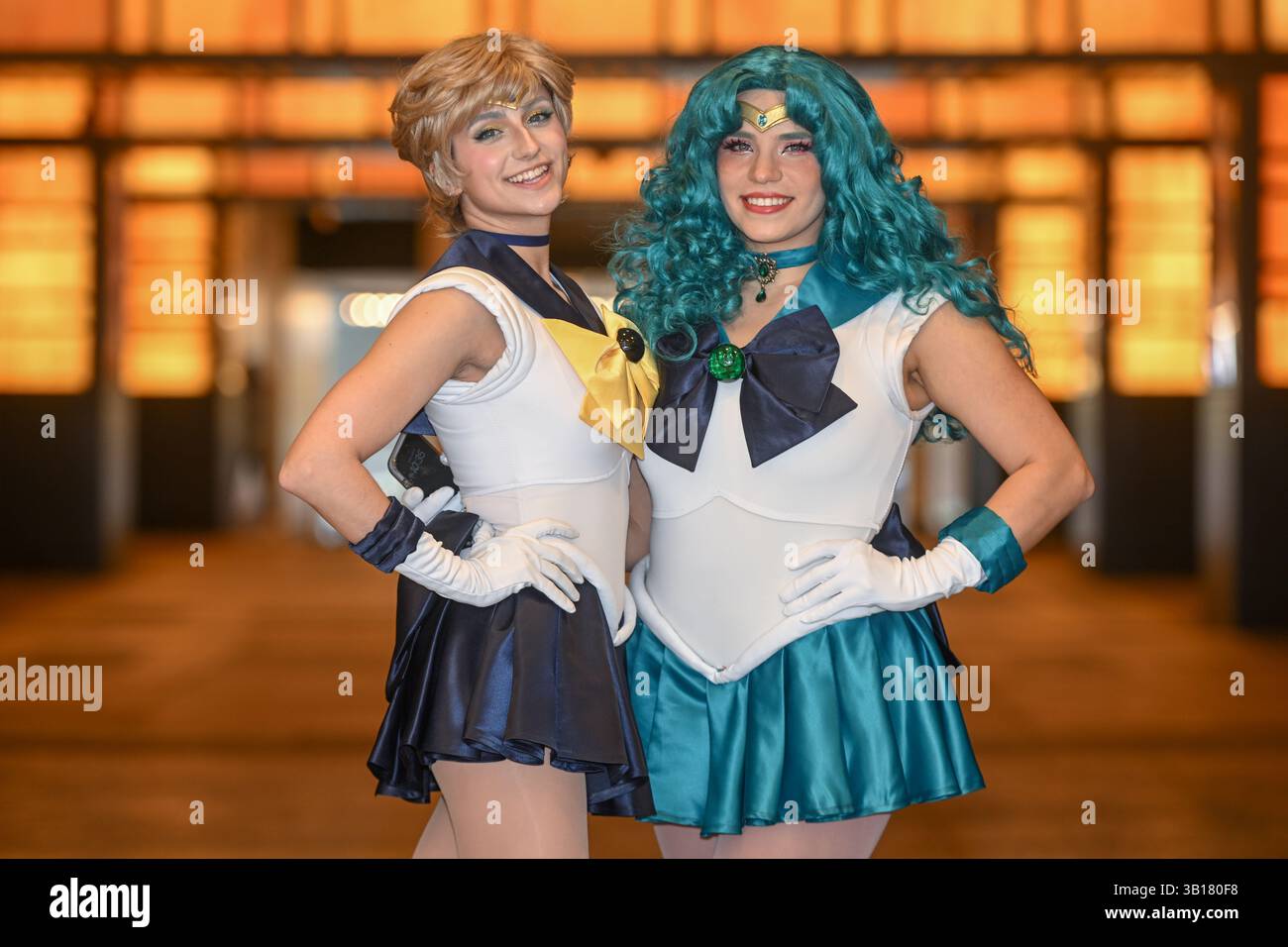 People dressed in cosplay attend a 'Pretty Guardian Sailor Moon: The ...