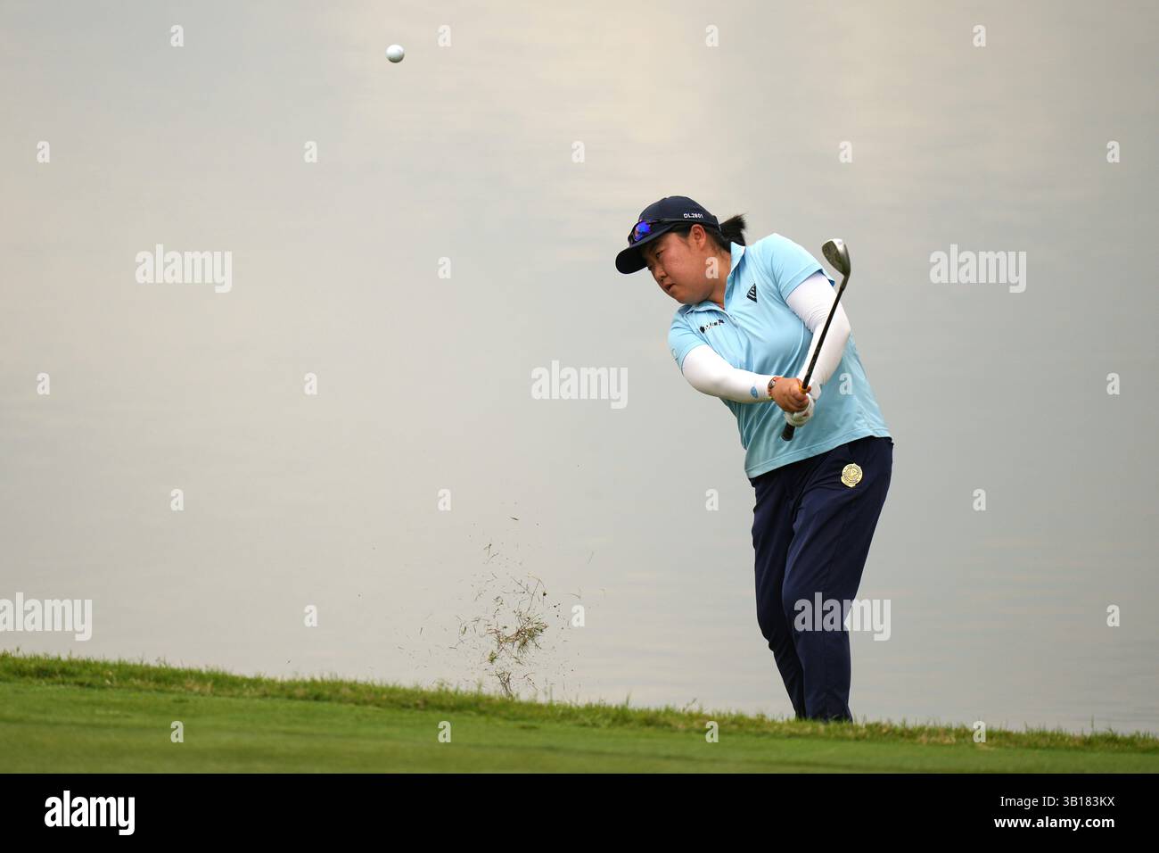 Ruixin Liu, of China, hits on the ninth hole during the second round of ...