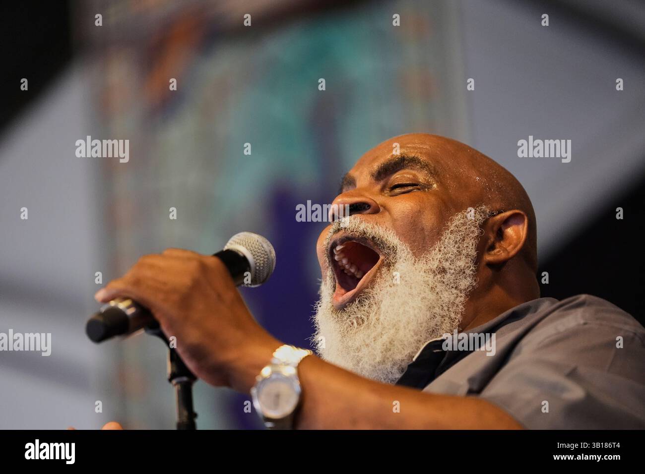 Gospel choir director Clyde Lawrence leads the Eleanor McMain Secondary School Singing Mustangs ...