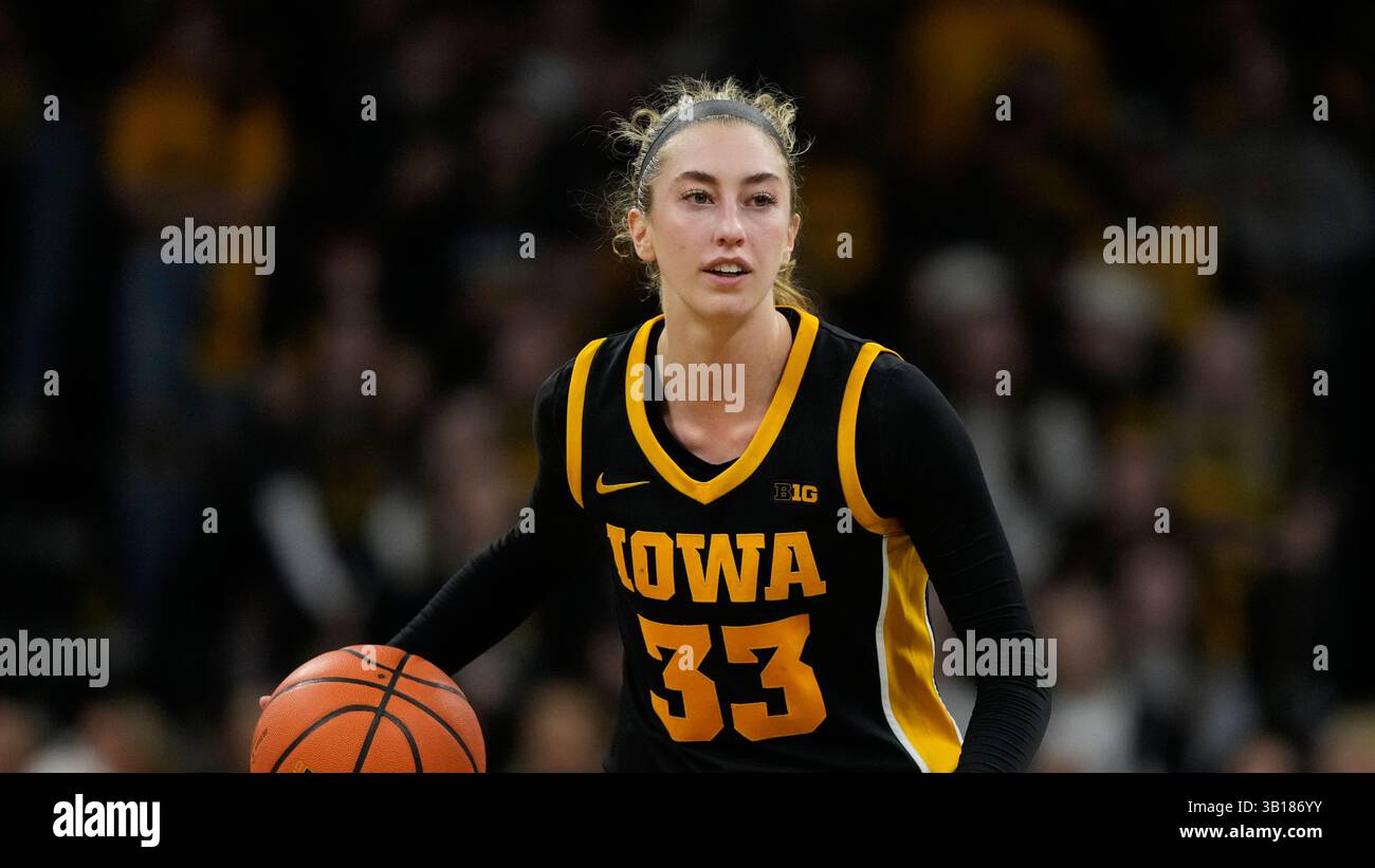 Iowa guard Lucy Olsen drives up court during the second half of an NCAA ...