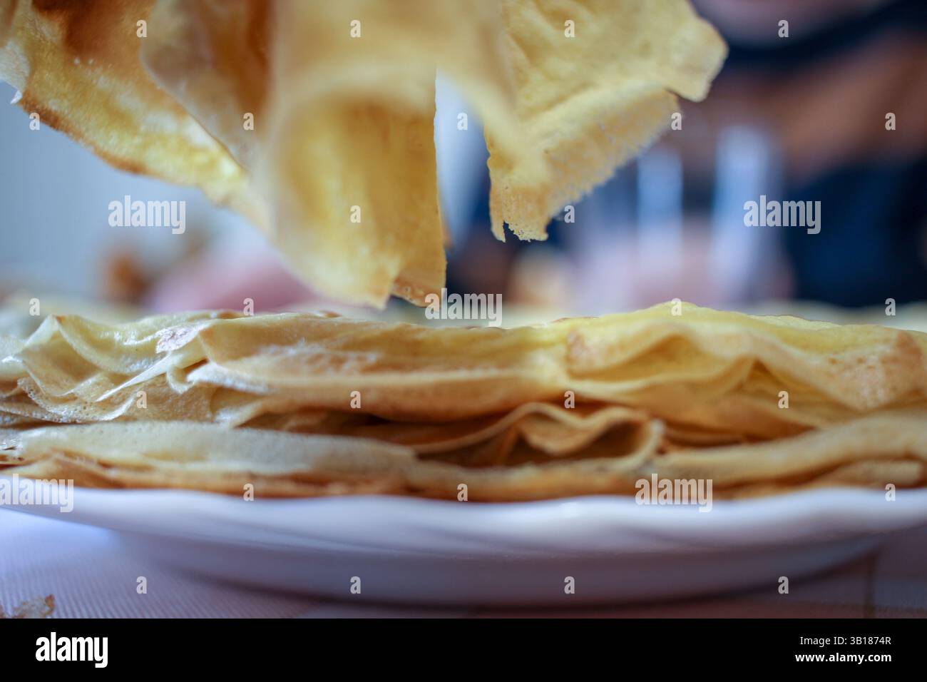 eating delicious crepes at home as a desert Stock Photo - Alamy