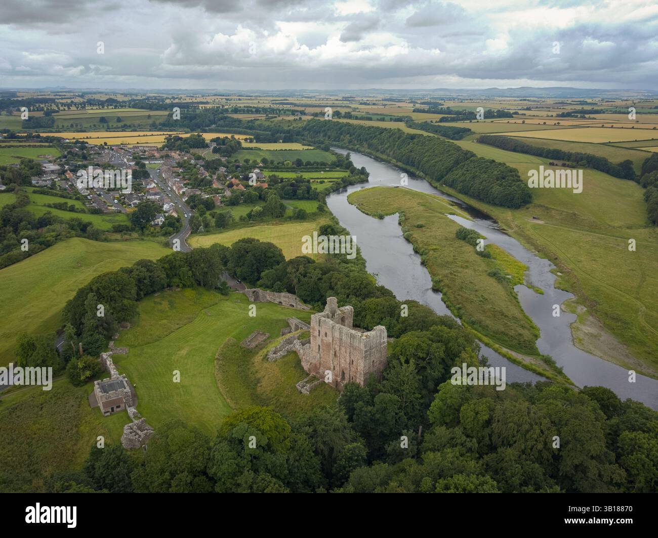 Aerial photo of Norham castle on the banks of the river Tweed in ...
