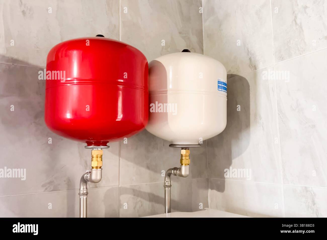 Expansion tanks of the heating system in a private house Stock Photo ...