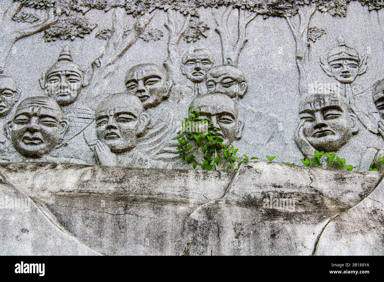 Vietnam, Nha Trang. Long Son Pagoda (Chua Long Son). Praying monks bas ...