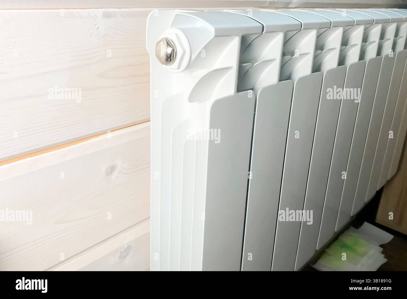 White radiators of the heating system. New building house, heating ...