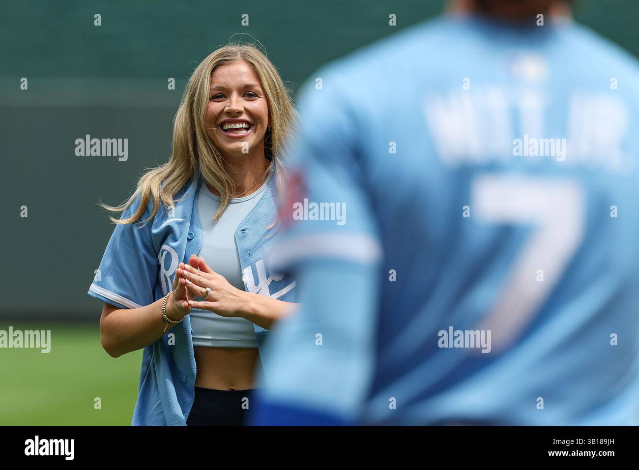 April 24, 2025: Maggie Witt looks to her husband, Kansas City Royals ...