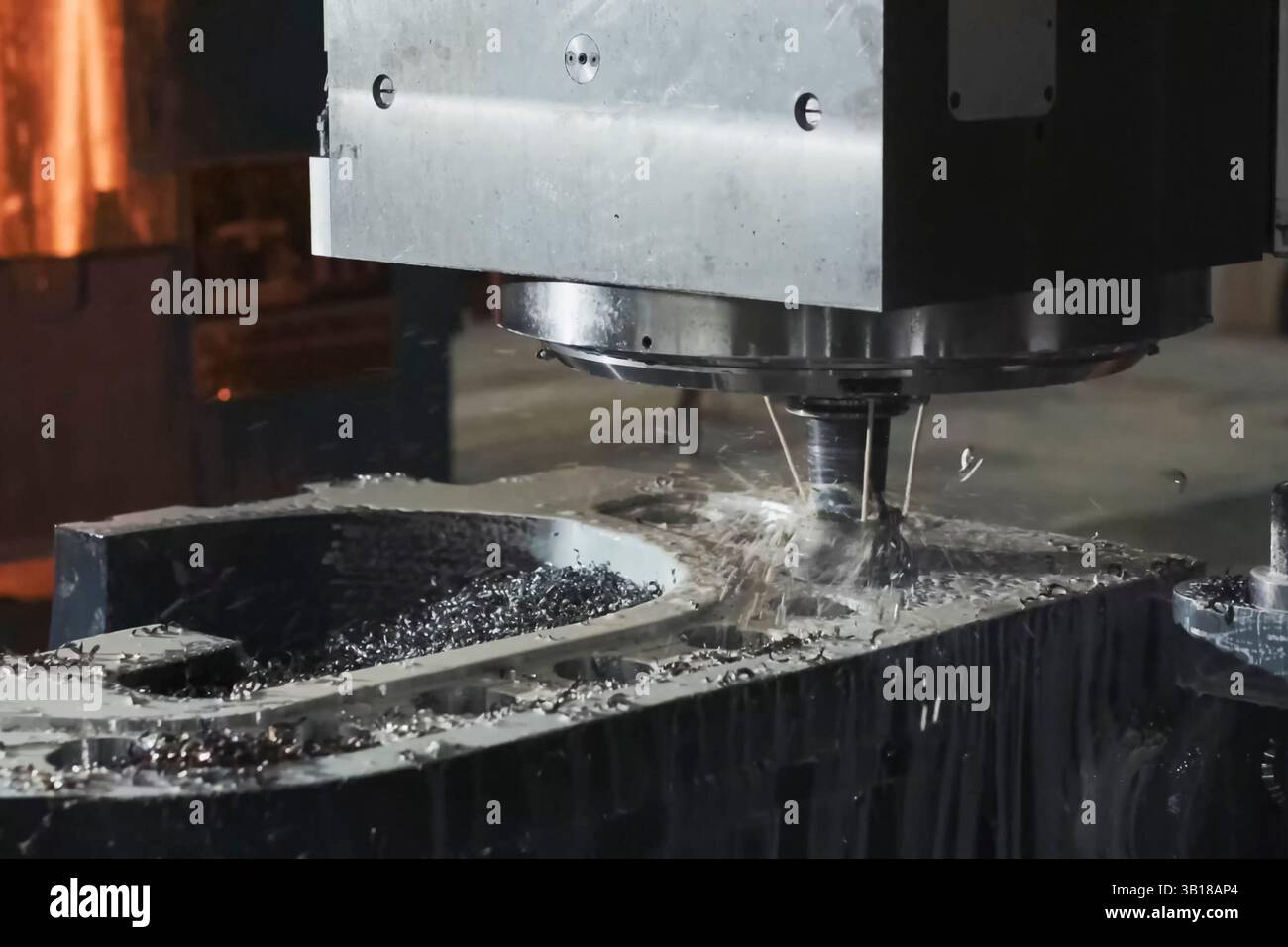drilling metal with cooling of the drill with liquid Stock Photo - Alamy