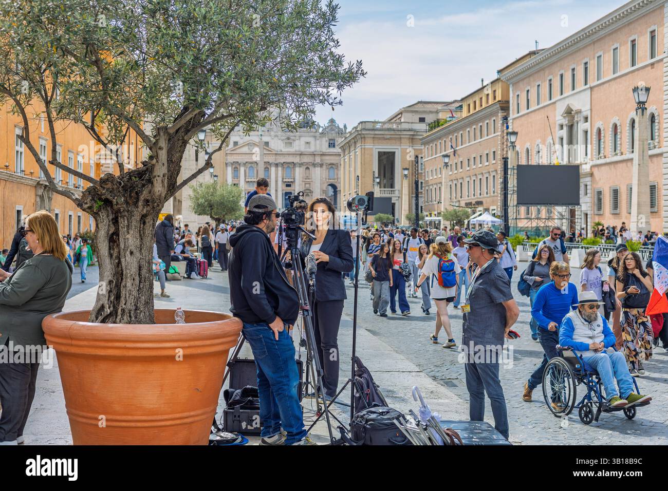 Vatican - April, 23, 2025: Female reporter and crew filming live ...