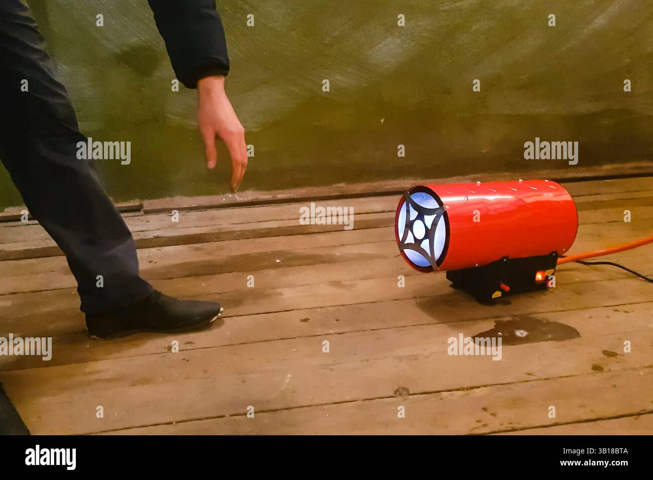 Heat gun powered by natural gas. Room heating Stock Photo - Alamy