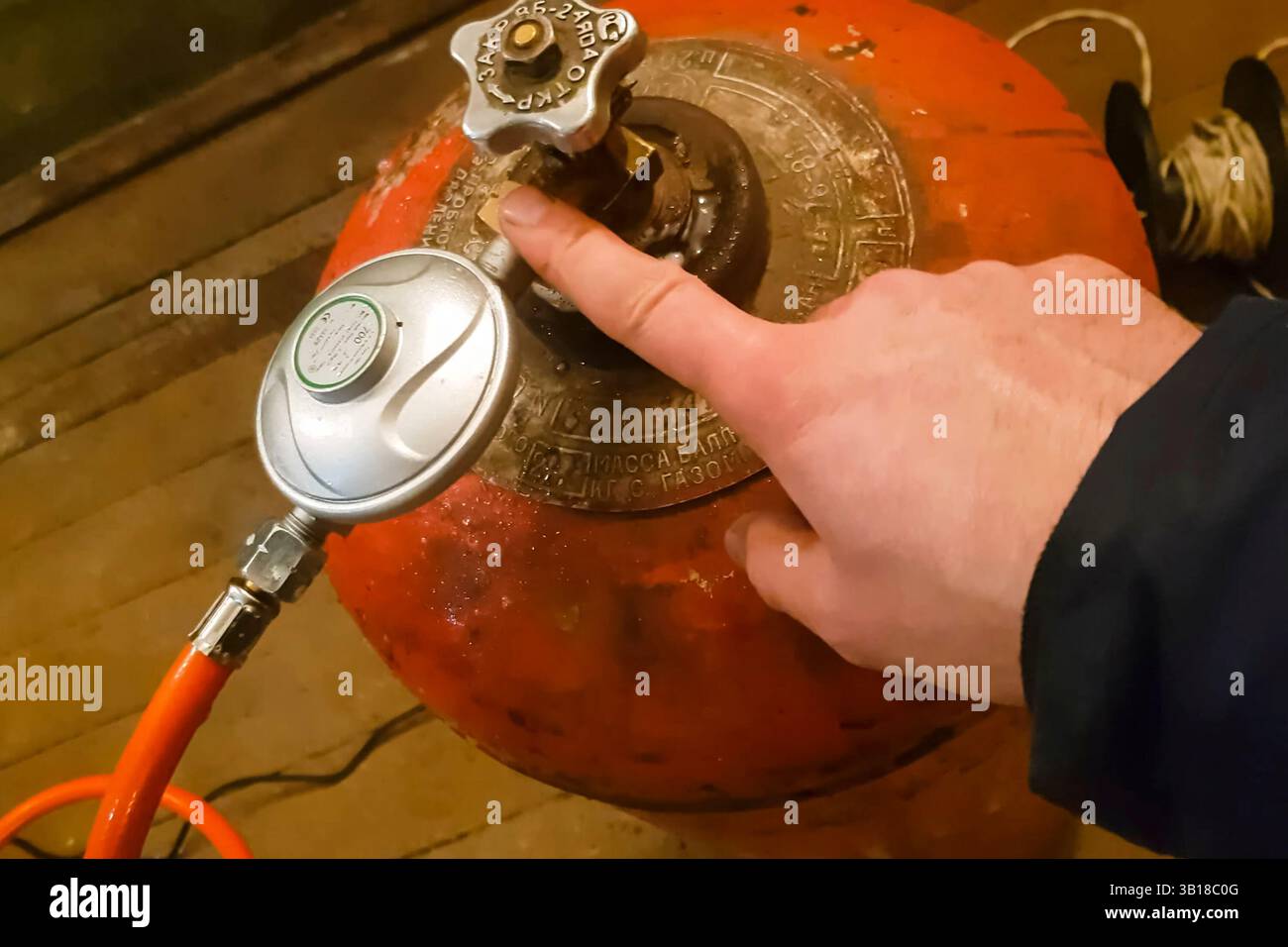 A tap and a valve on a gas cylinder. Gas equipment Stock Photo - Alamy