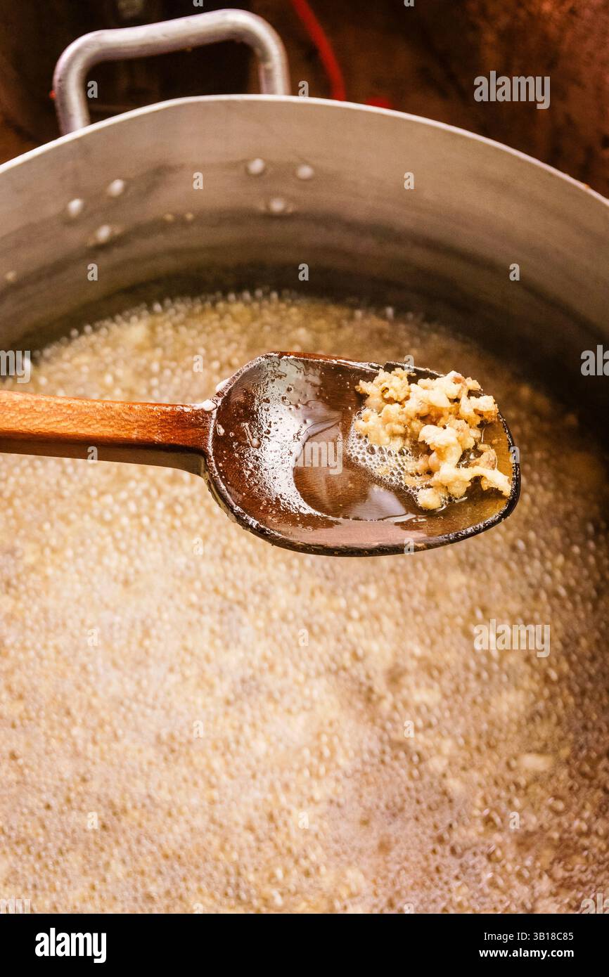 Separation of pork rinds from fat, traditional pig slaughter, Llucmajor ...