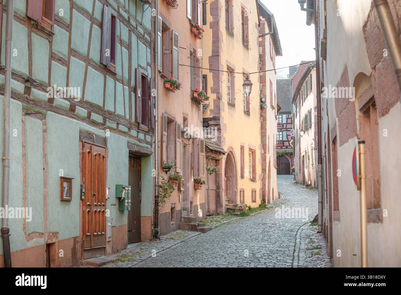 Traditional half-timbered houses in the medieval village of Riquewihr ...