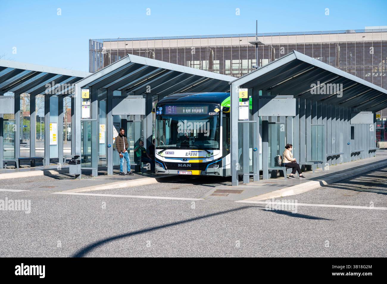 Local De Lijn bus hub at the train station of Ieper, West Flanders ...