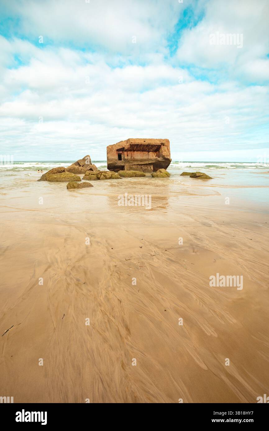 Old WWII-era bunker ruins on Plage Santocha beach in Capbreton, France ...
