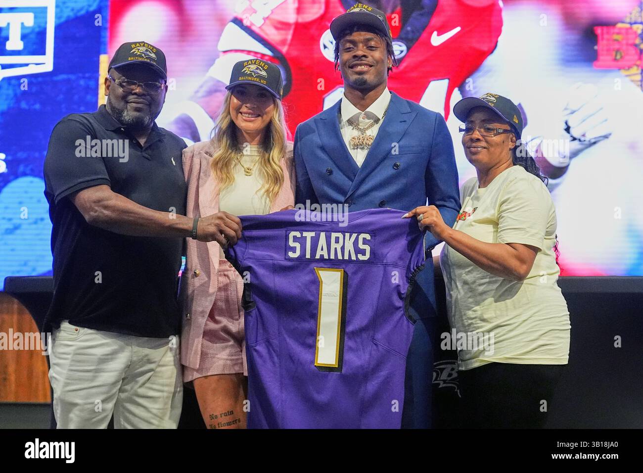 Safety Malaki Starks, center, the Baltimore Ravens first round draft ...