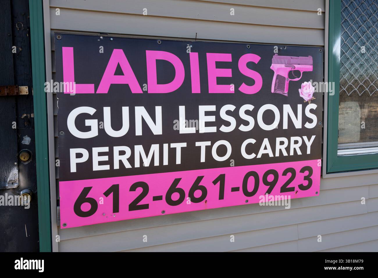 St. Paul, Minnesota. Sign advertising gun lessons and permit to carry ...