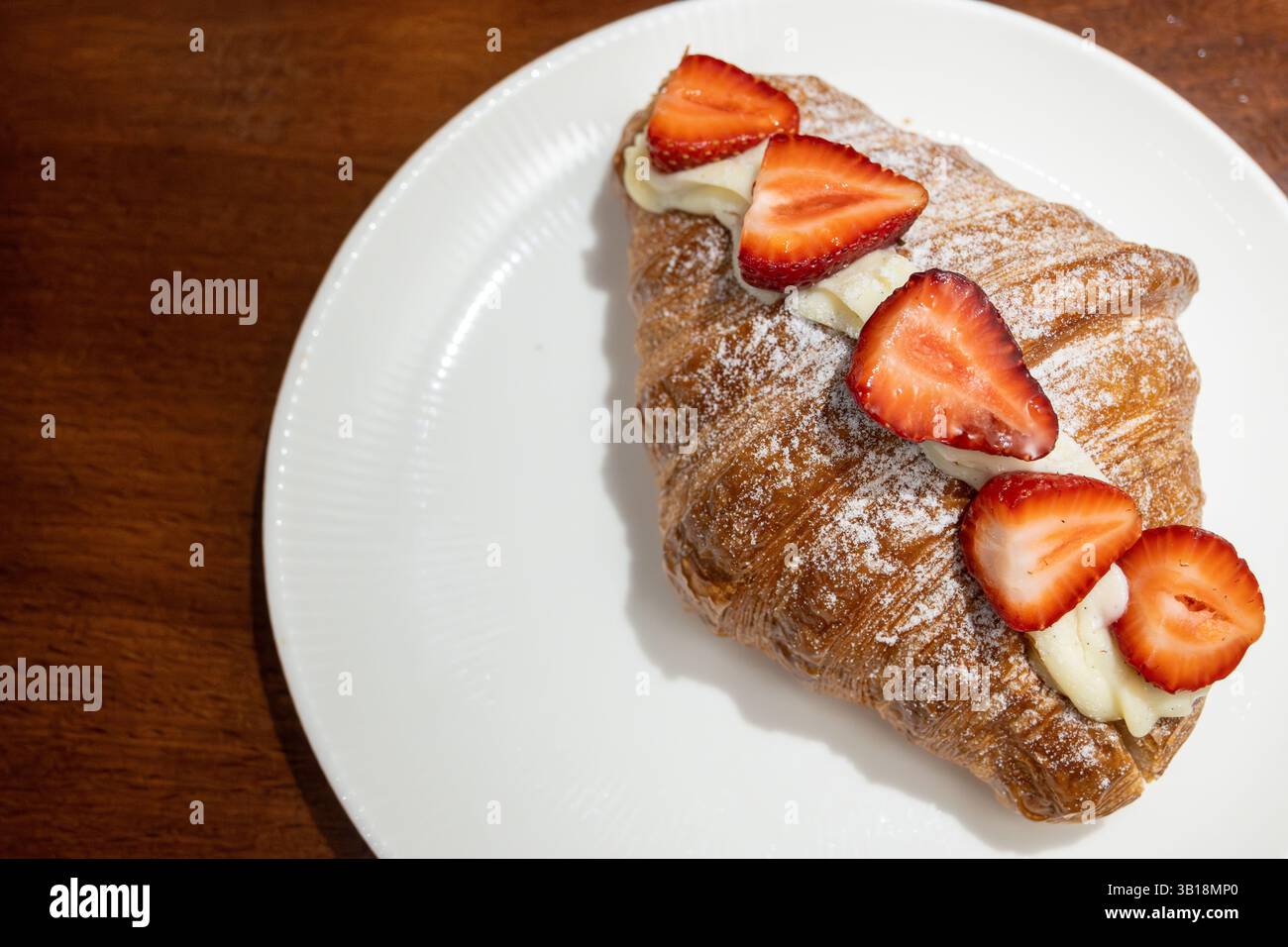 Deliciously Sweet Strawberry Croissant with Powdered Sugar Stock Photo ...