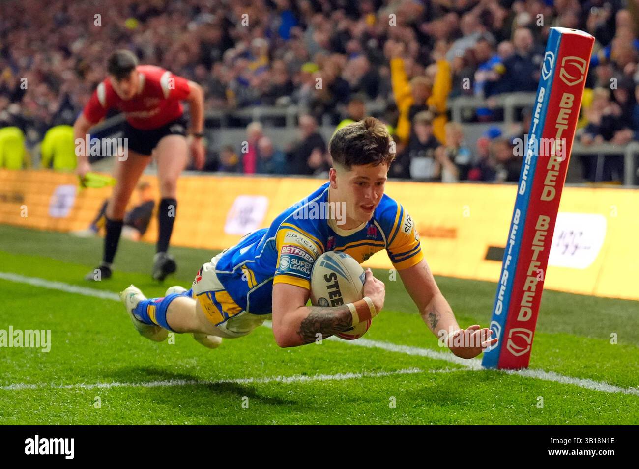 Leeds Rhinos' Riley Lumb scores his side's second try of the game ...