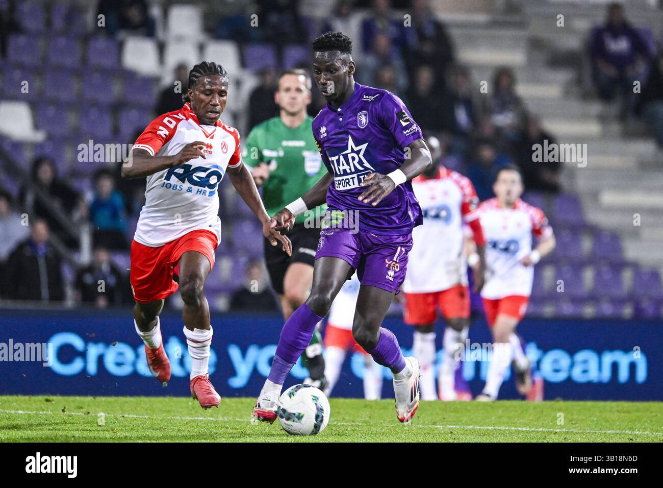 Antwerp, Belgium. 25th Apr, 2025. Kortrijk's Karim Dermane and ...