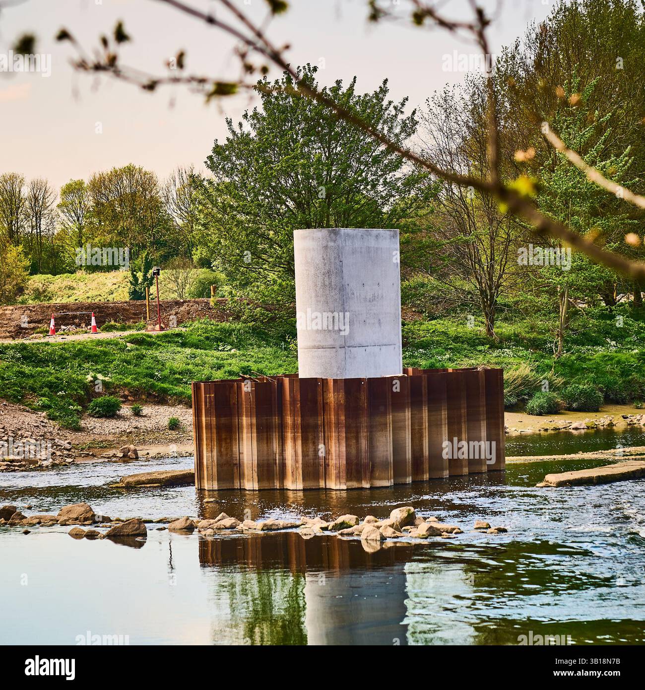 Cofferdam surrounding bridge leg in river during construction Stock ...