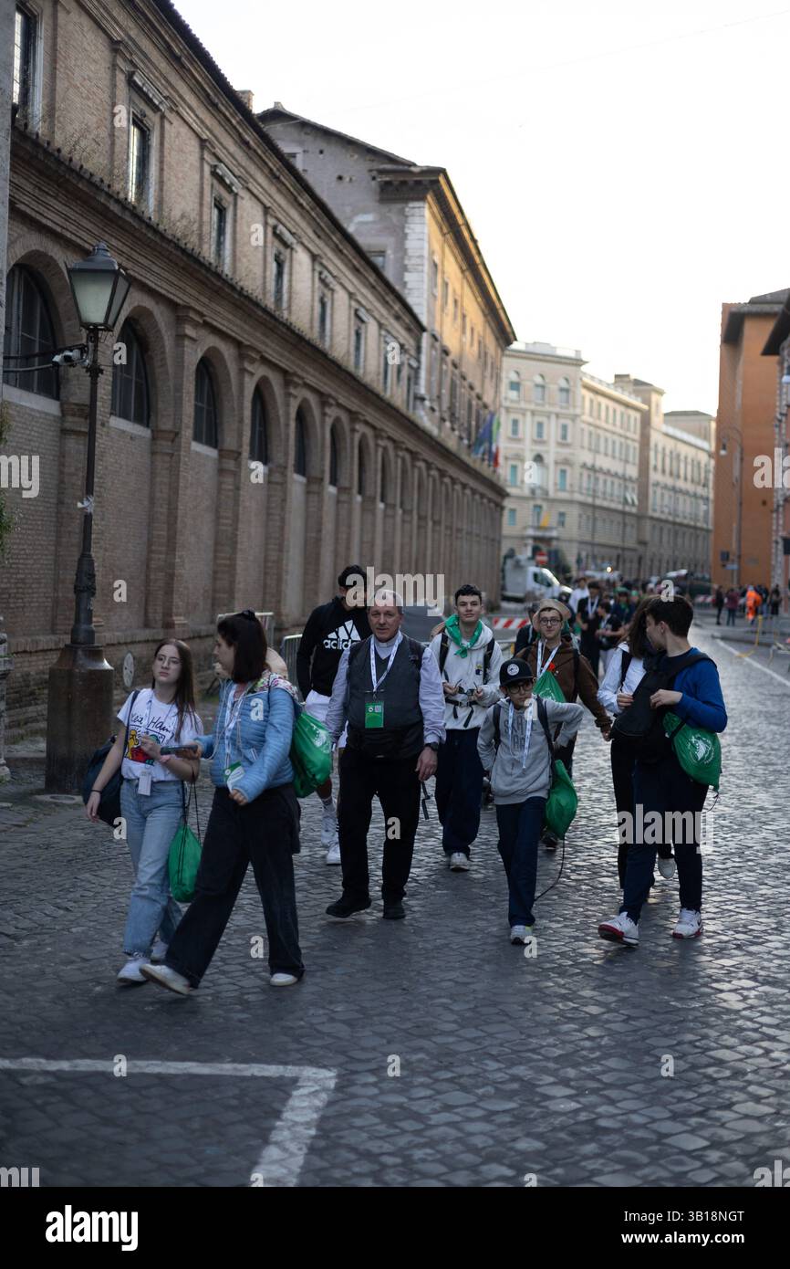 Scouts queue at the St Peter Basilica of the Vatican, in Rome on April ...