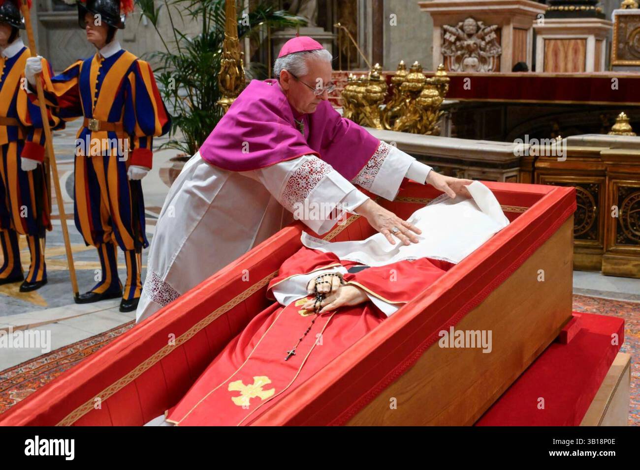 Vatican Master of Ceremonies Archbishop Diego Giovanni Ravelli covers ...