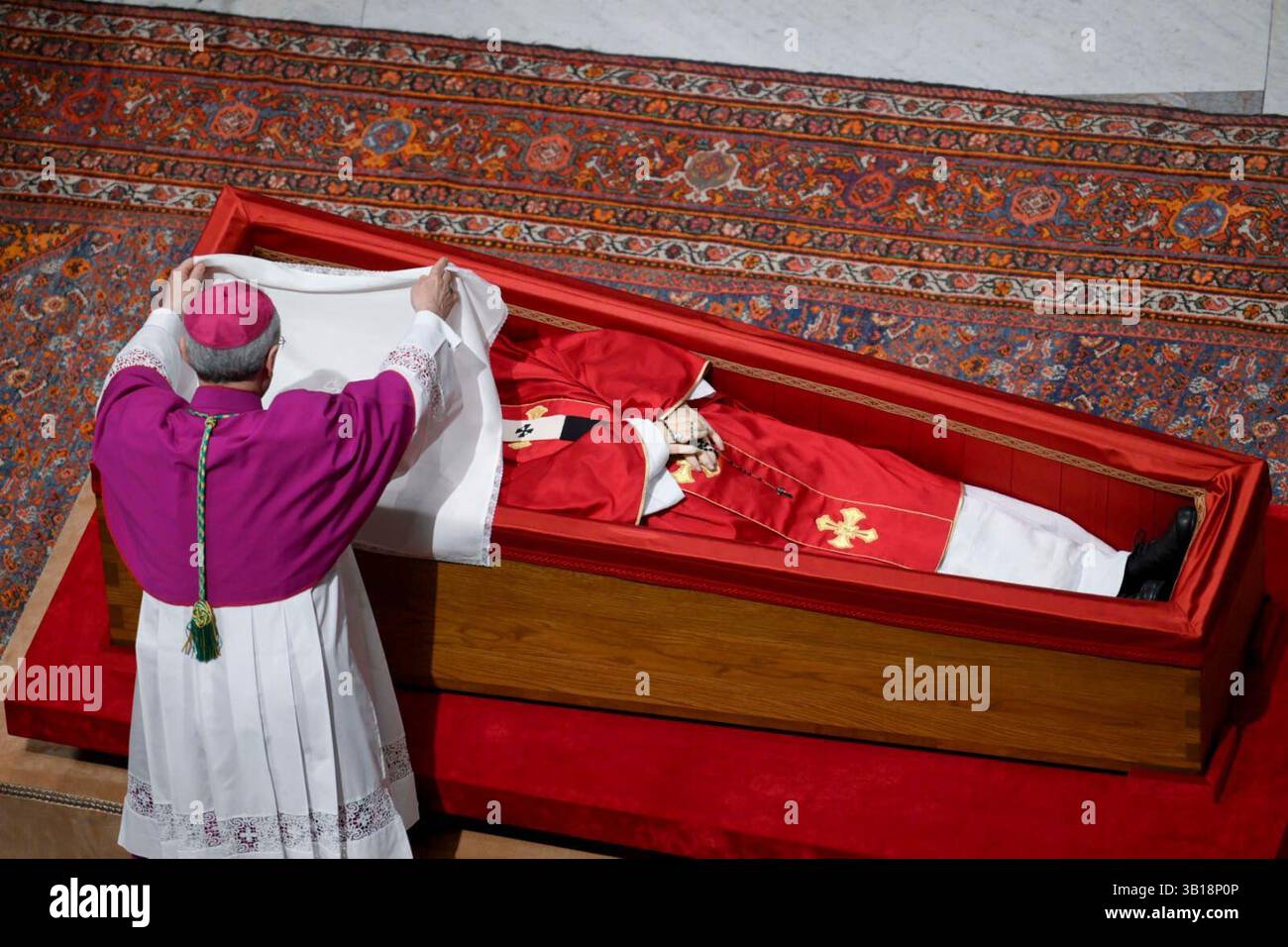 Vatican Master of Ceremonies Archbishop Diego Giovanni Ravelli covers ...