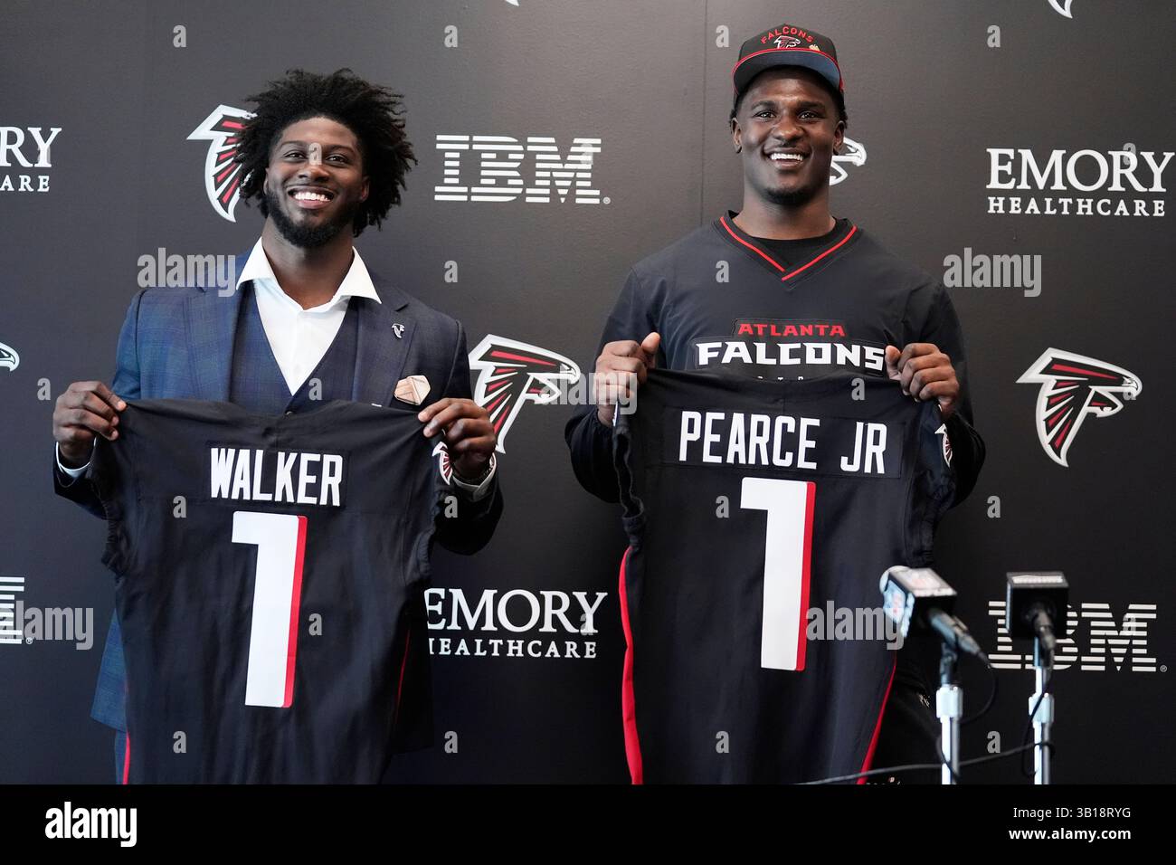 Atlanta Falcons first-round draft picks Jalon Walker, left and James ...