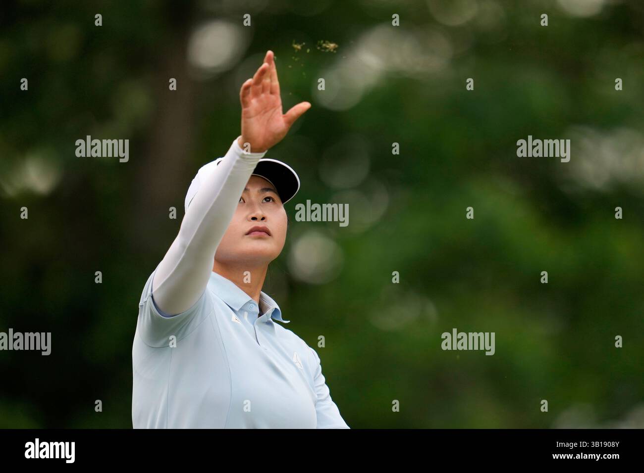 Yan Liu, of China, prepares to hit on the sixth hole during the second ...