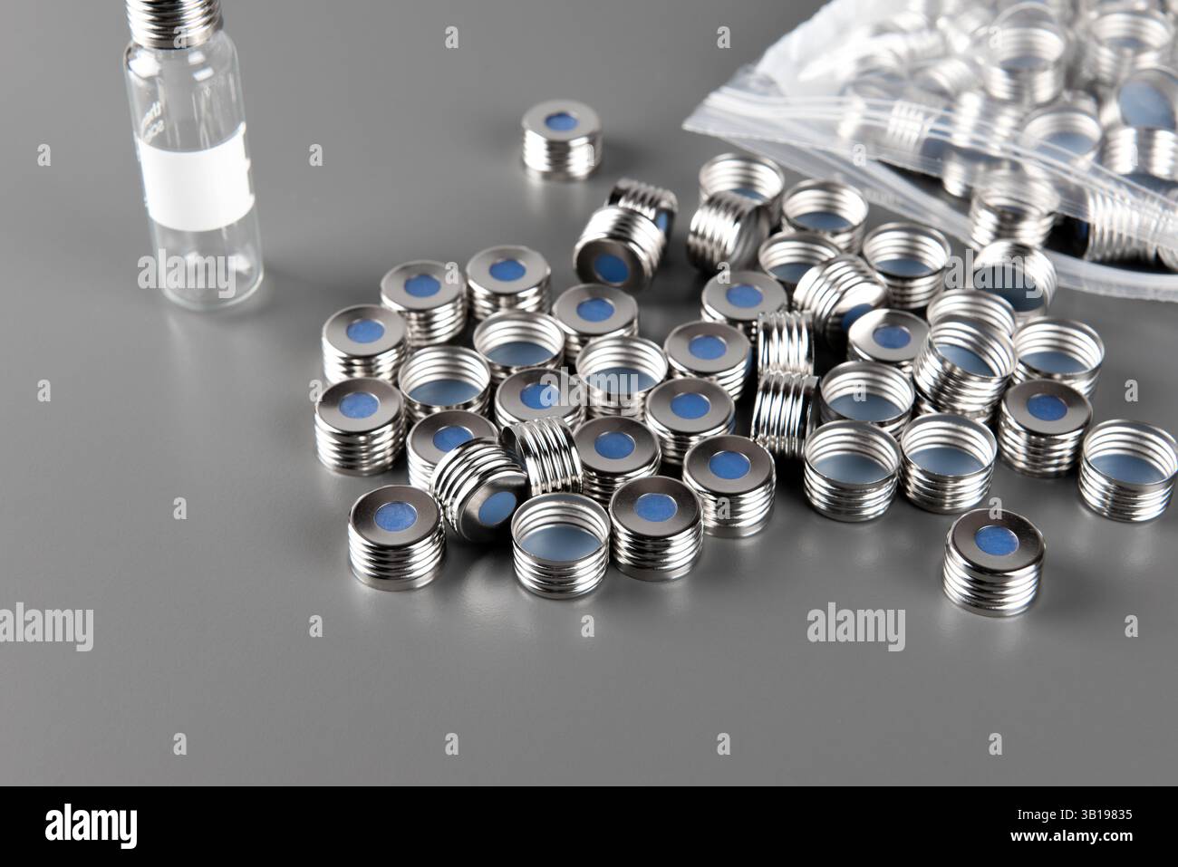 circular metallic cap with rubber septum for vials. HPLC, gas ...