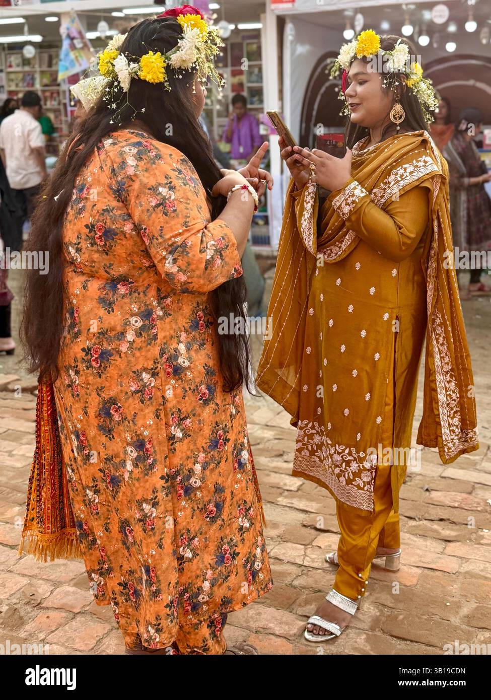 Local women taking pictures with their mobile phones at the Famous ...