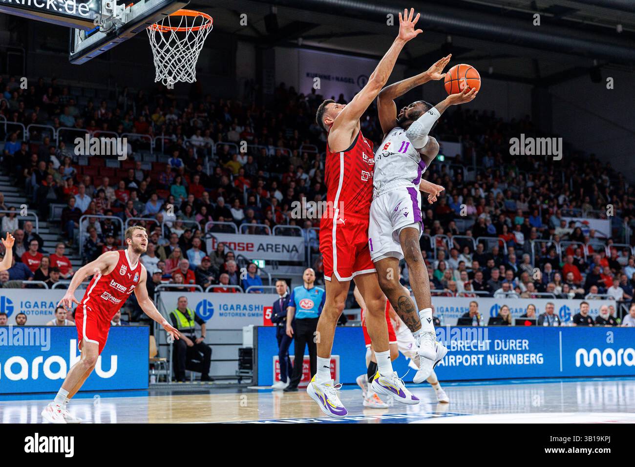Filip Stanic (Bamberg Baskets, #65), Chuba Ohams (BG Goettingen, #11 ...