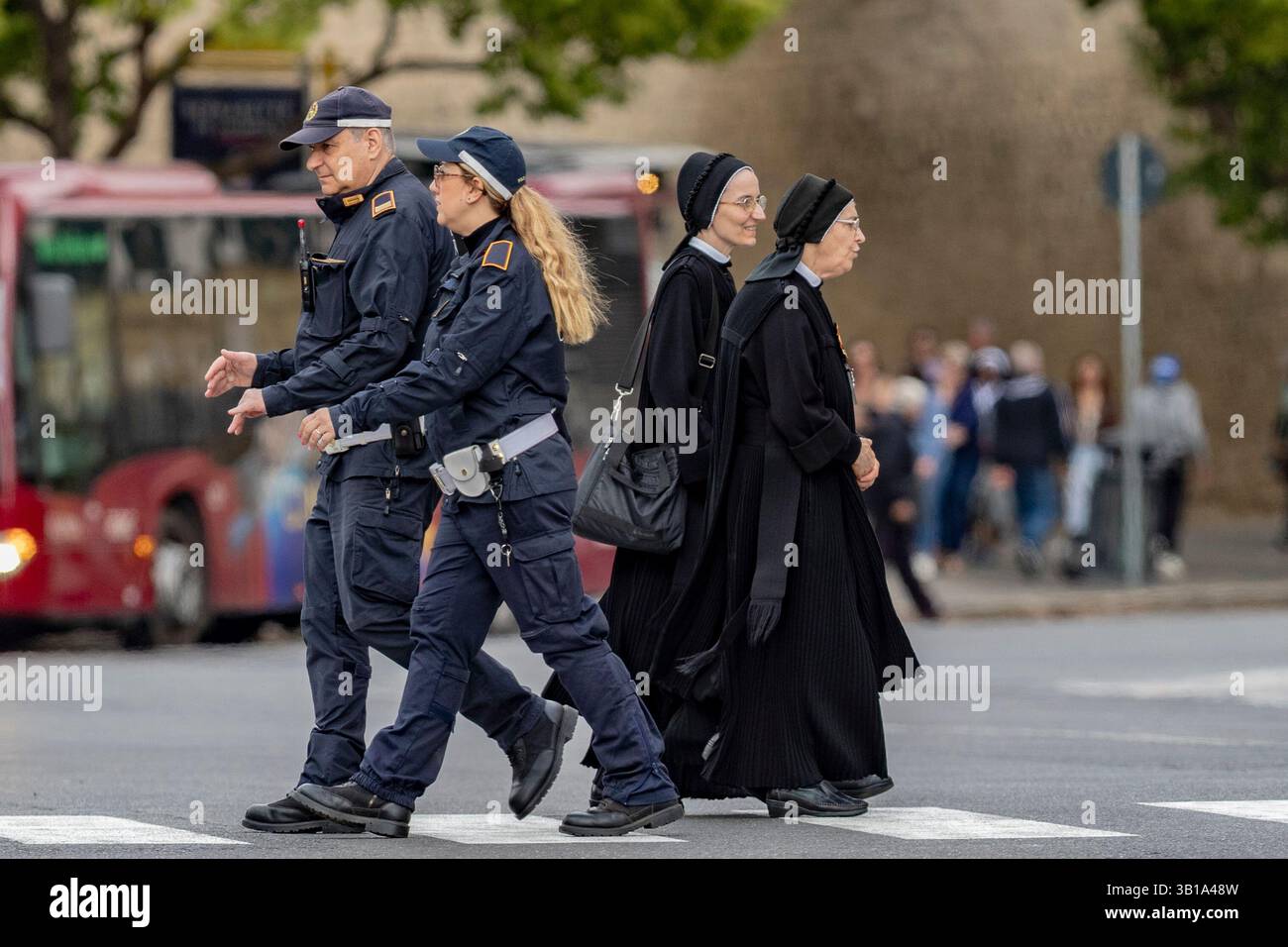 Vatican City, Southern Europe. 25th Apr, 2025. Two police officers and ...