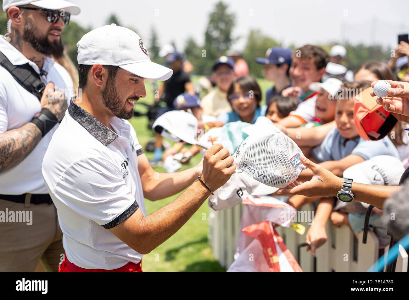 Abraham Ancer of Fireballs GC signs autographs for young golf fans at ...