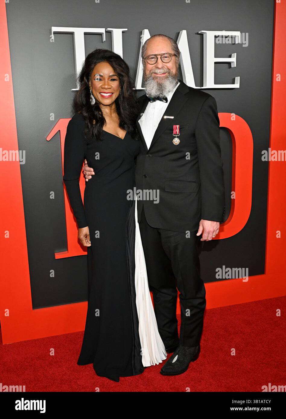 Dr. Robert Montgomery, right, and Denyce Graves attend the Time100 Gala ...