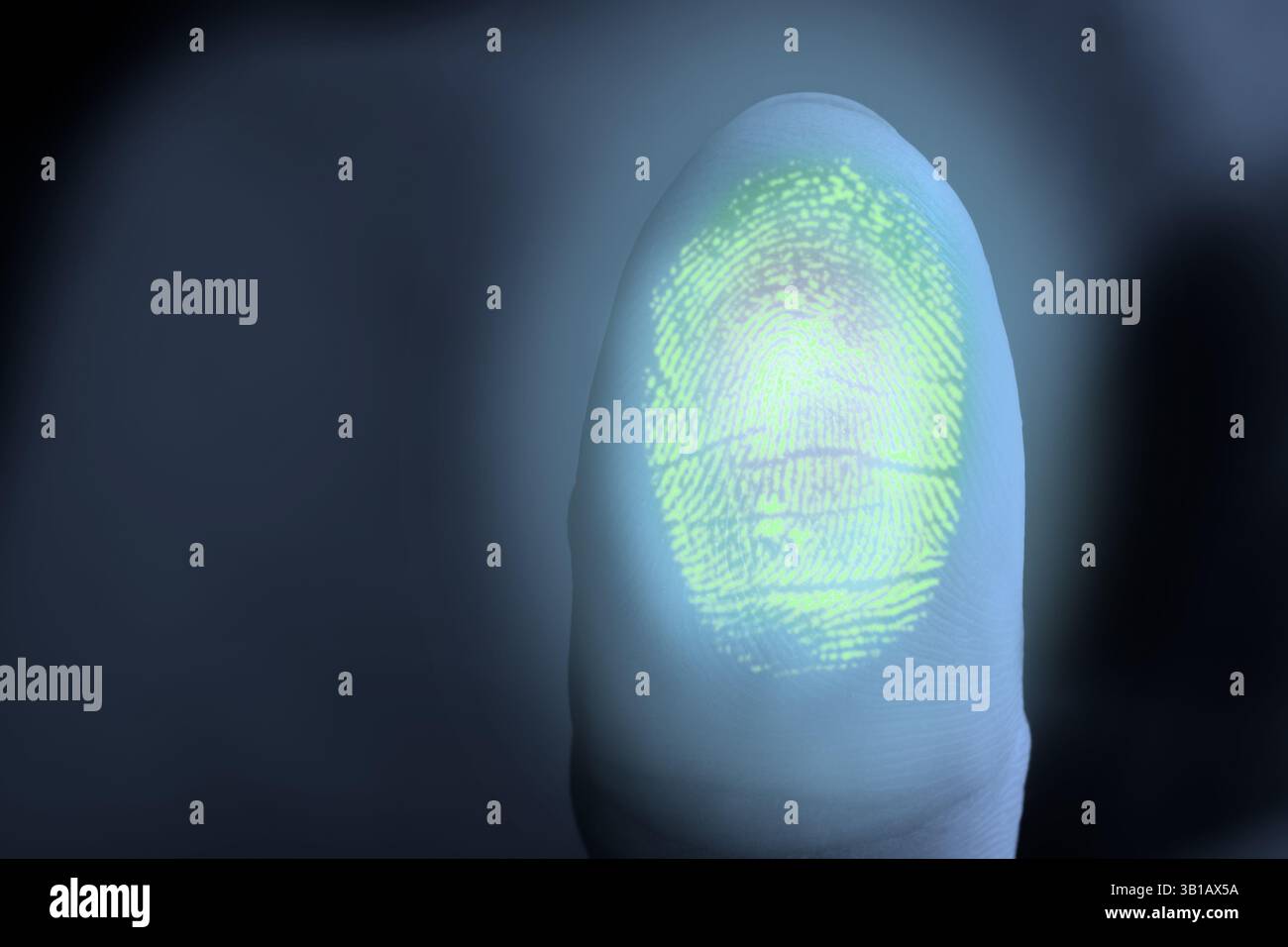 Colorful fingerprint remaining on surface while woman pressing her ...
